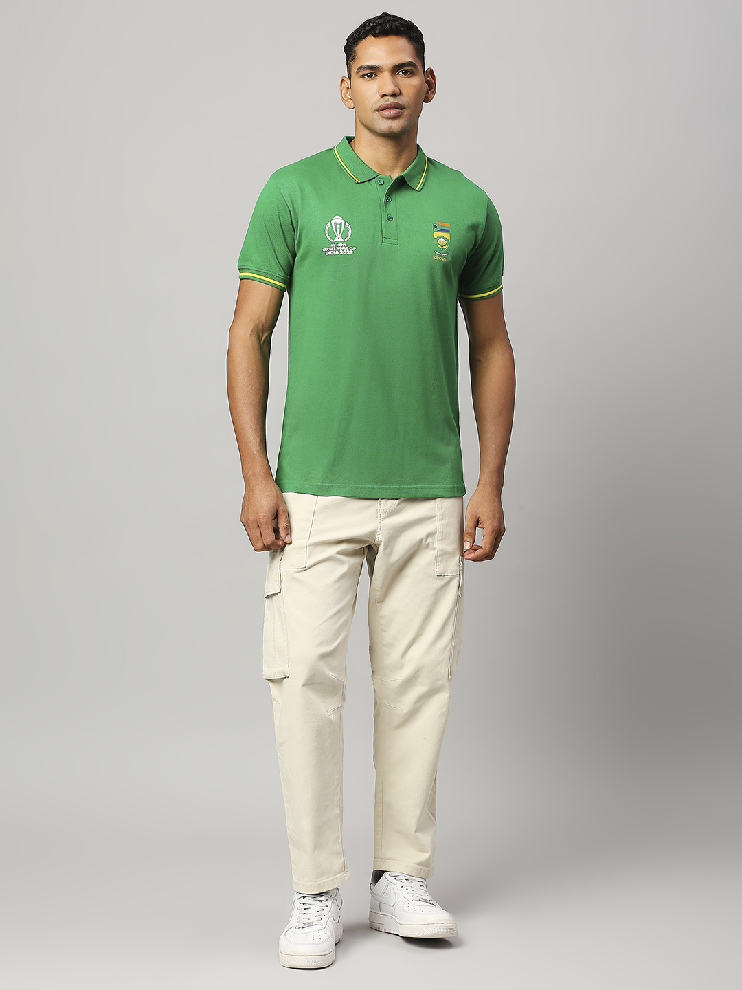 Buy Official ICC CWC-23 Men Green Solid Short Sleeves Polo Collar T ...